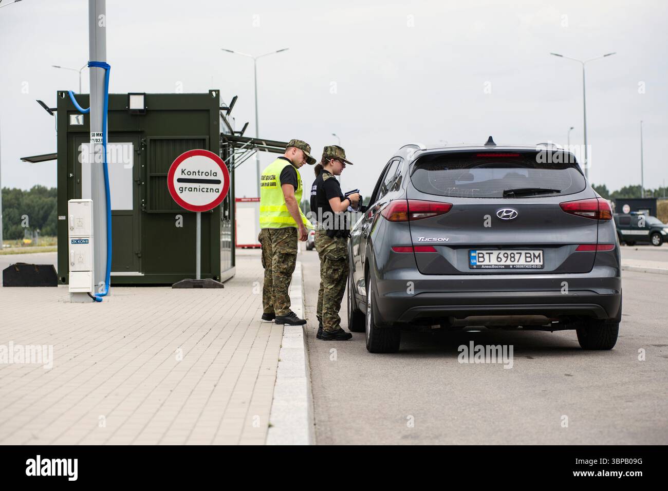 Polish border guards perform controls of vehicles at the checkpoint ...