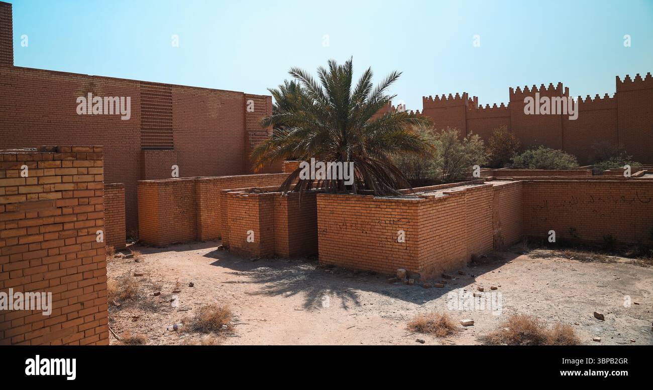 Historic brick structures surround flourishing palm trees in the ...