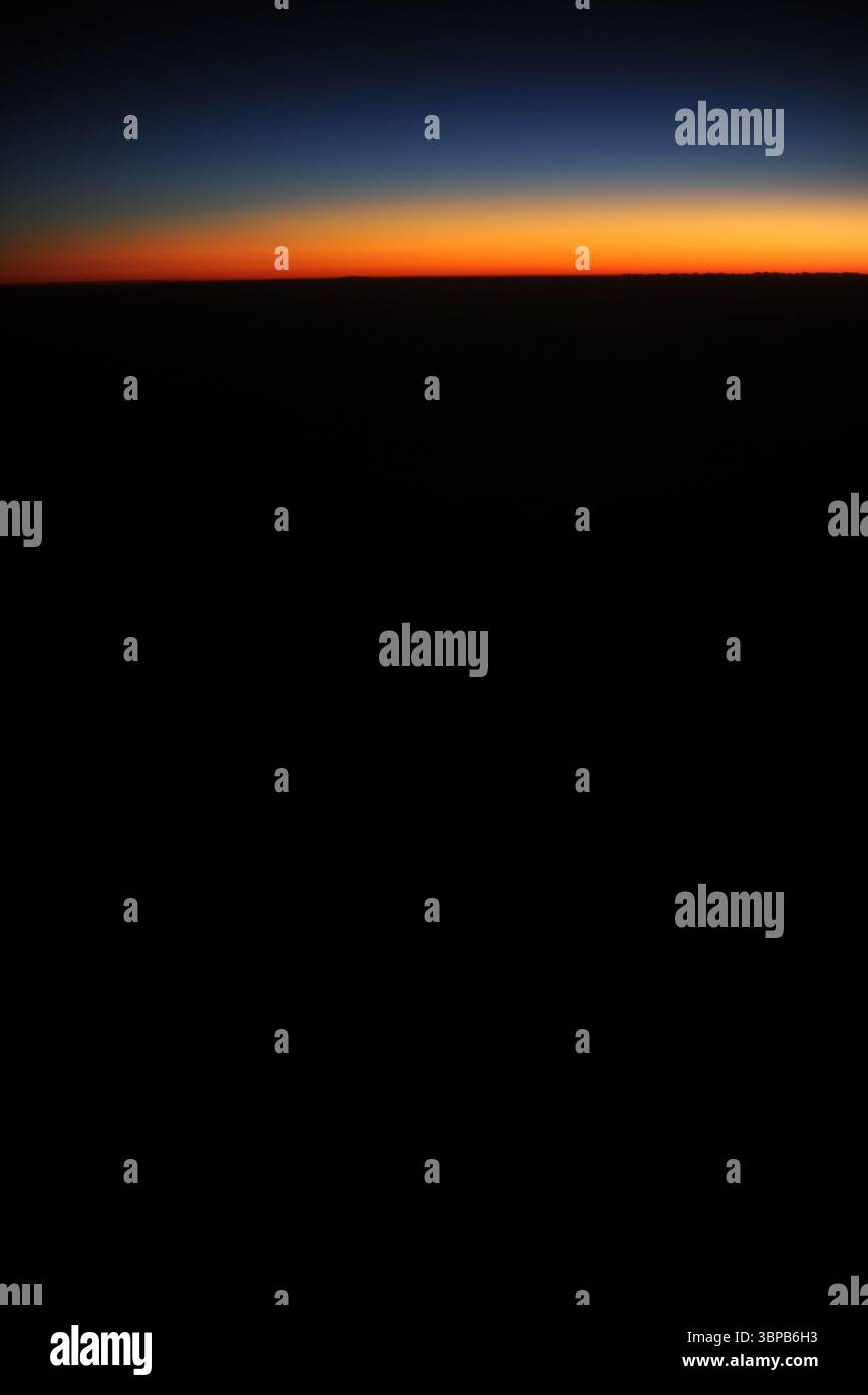 Twilight and dawn at sunrise with clear sky and clear horizon line ...