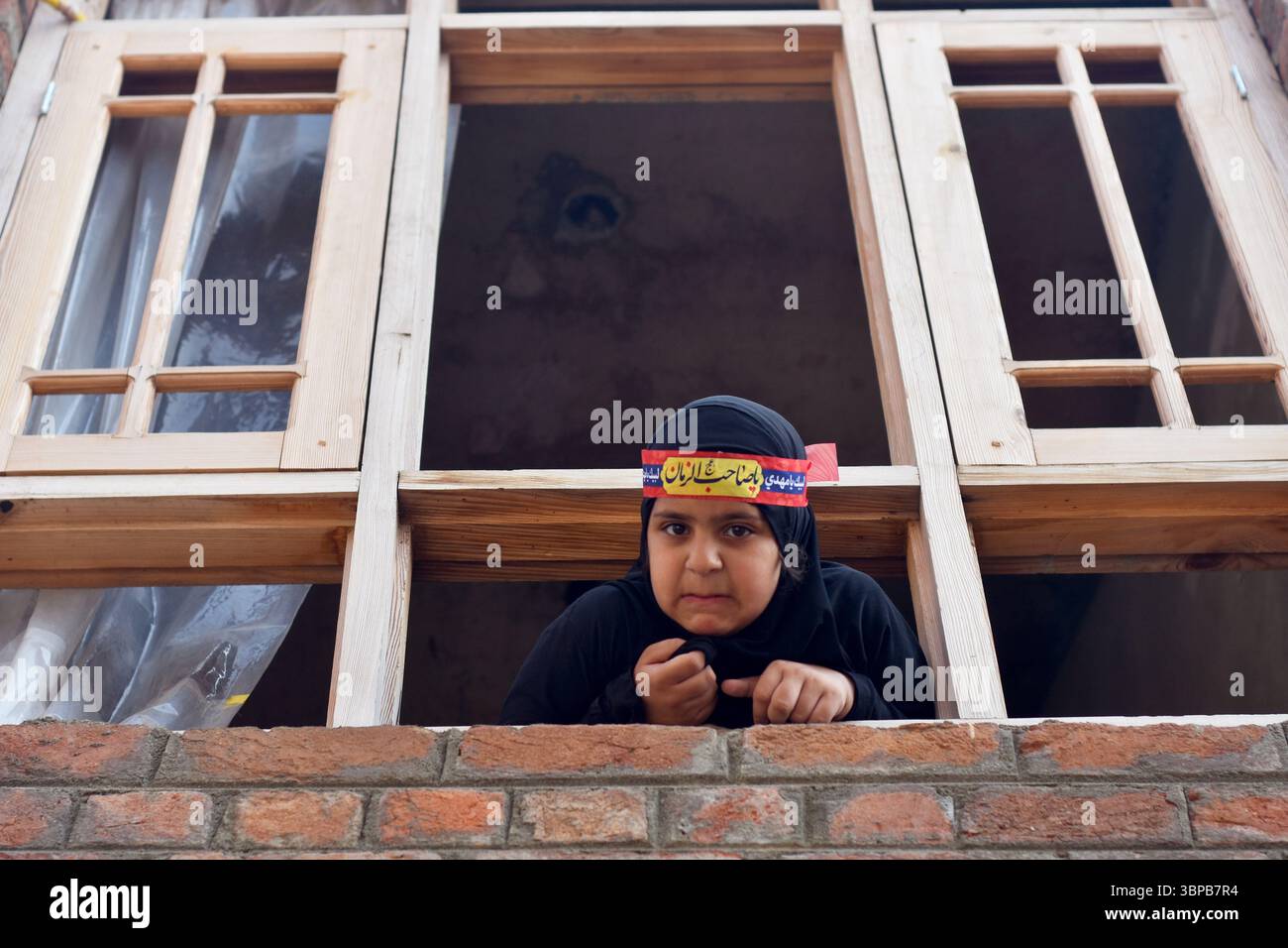 Srinagar, India. 07th July, 2025. A small kashmiri Shiite Muslim girl ...