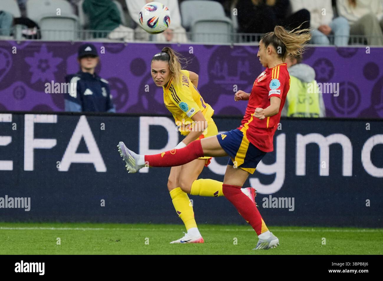 Spain's Lucia Garcia, right, and Belgium's Jill Janssens challenge for ...