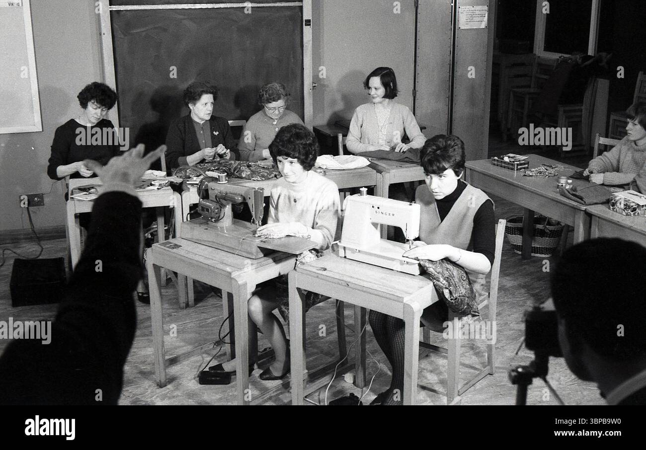 1960s, historical, inside a school or college classroom, a number of ...