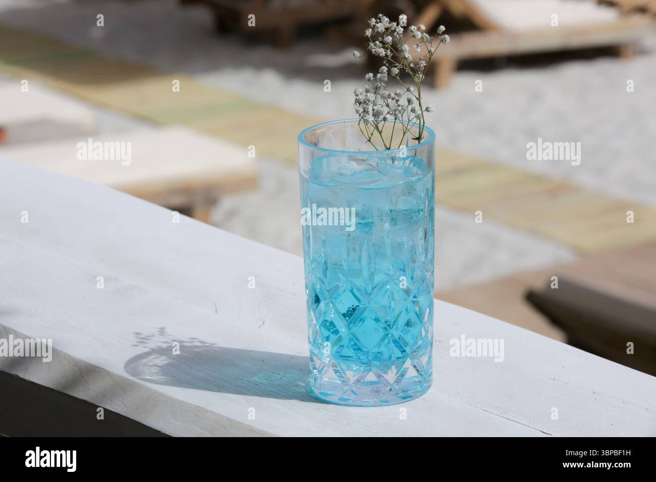 Blue Lagoon Cocktail, Angelo azzurro cocktail in tall glass on the ...