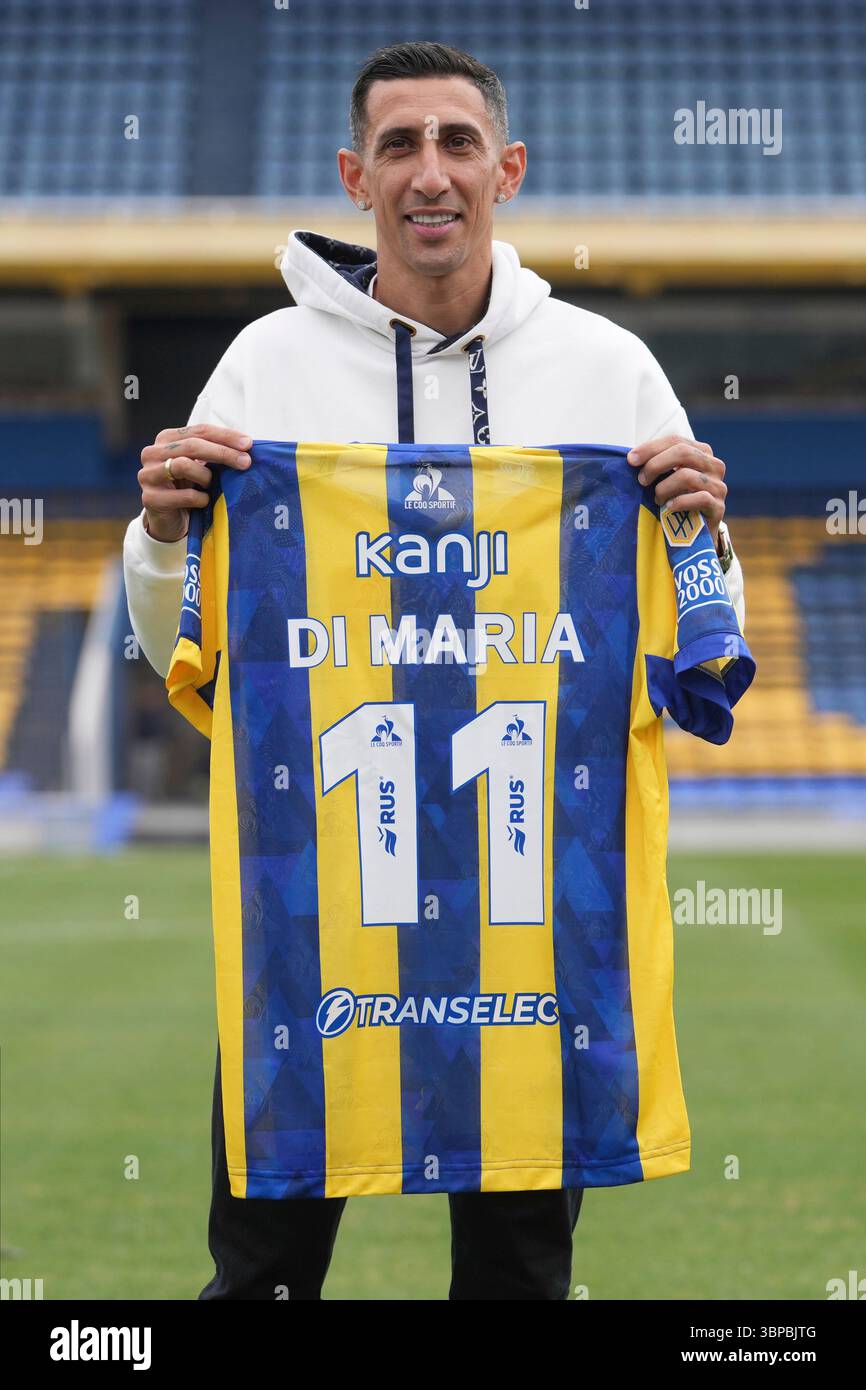 Angel Di Maria shows his Rosario Central soccer club jersey during his ...