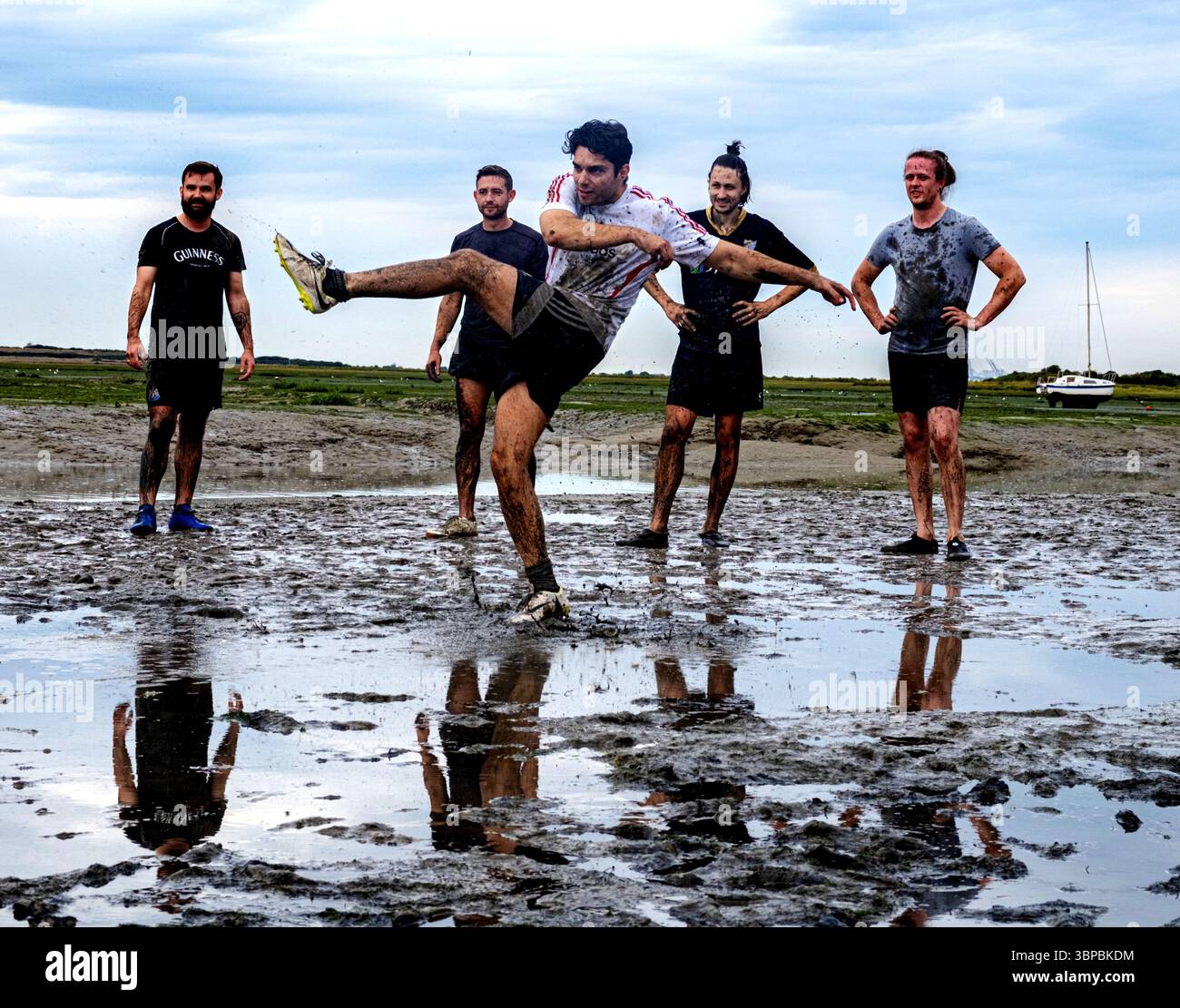 'Mud Football' - Football on the mud at the Old Leigh Regatta, Leigh on ...