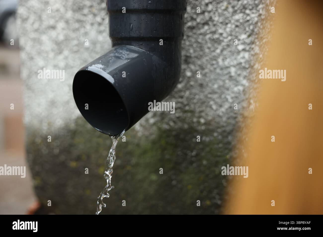 Water dripping from drain pipe outdoors, closeup Stock Photo - Alamy