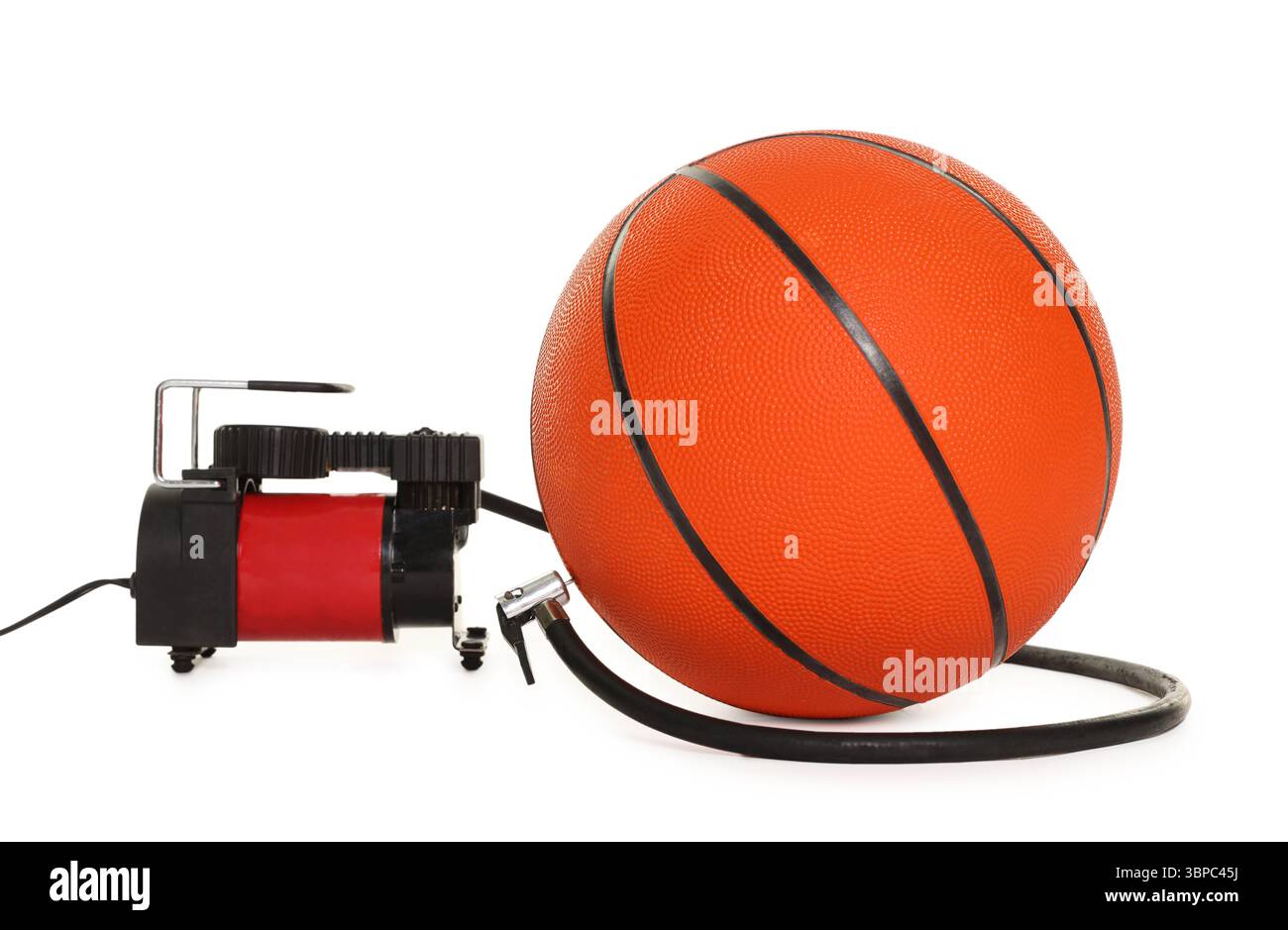 Basketball ball and air compressor isolated on white Stock Photo - Alamy