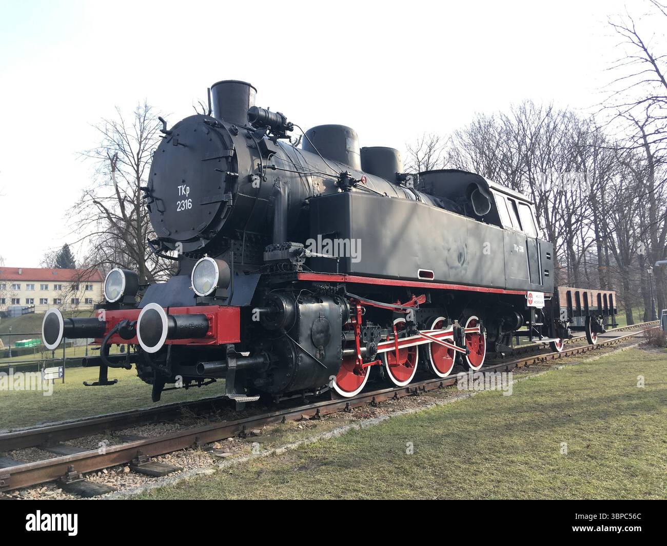 A vintage Polish steam tank locomotive on a plinth in Kraków’s park ...