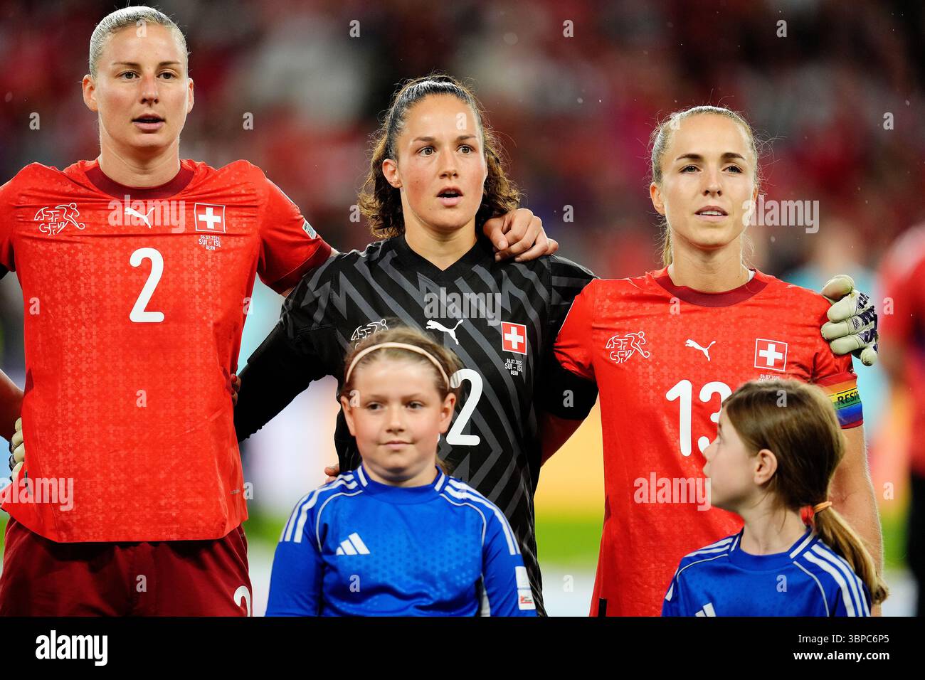 Switzerland's Julia Stierli (left), goalkeeper Livia Peng (centre) and ...