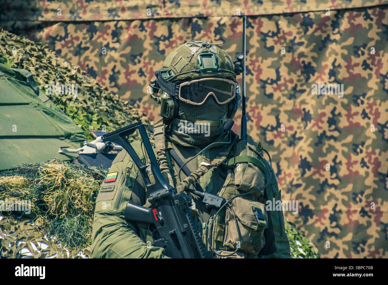 Lithuanian Army Special Forces soldier with military gear, protective ...