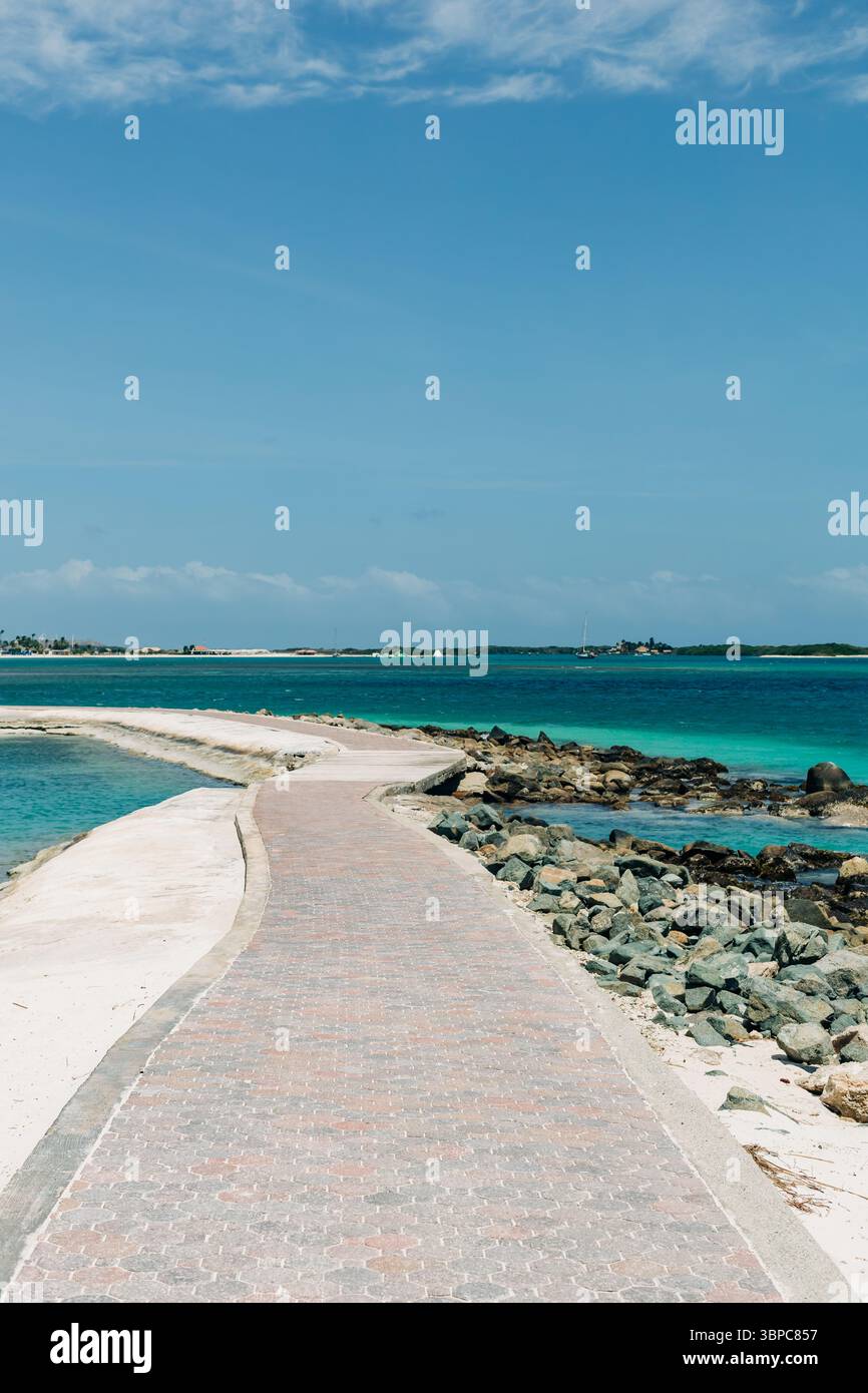 A curved path along the coast invites visitors to enjoy the stunning ...