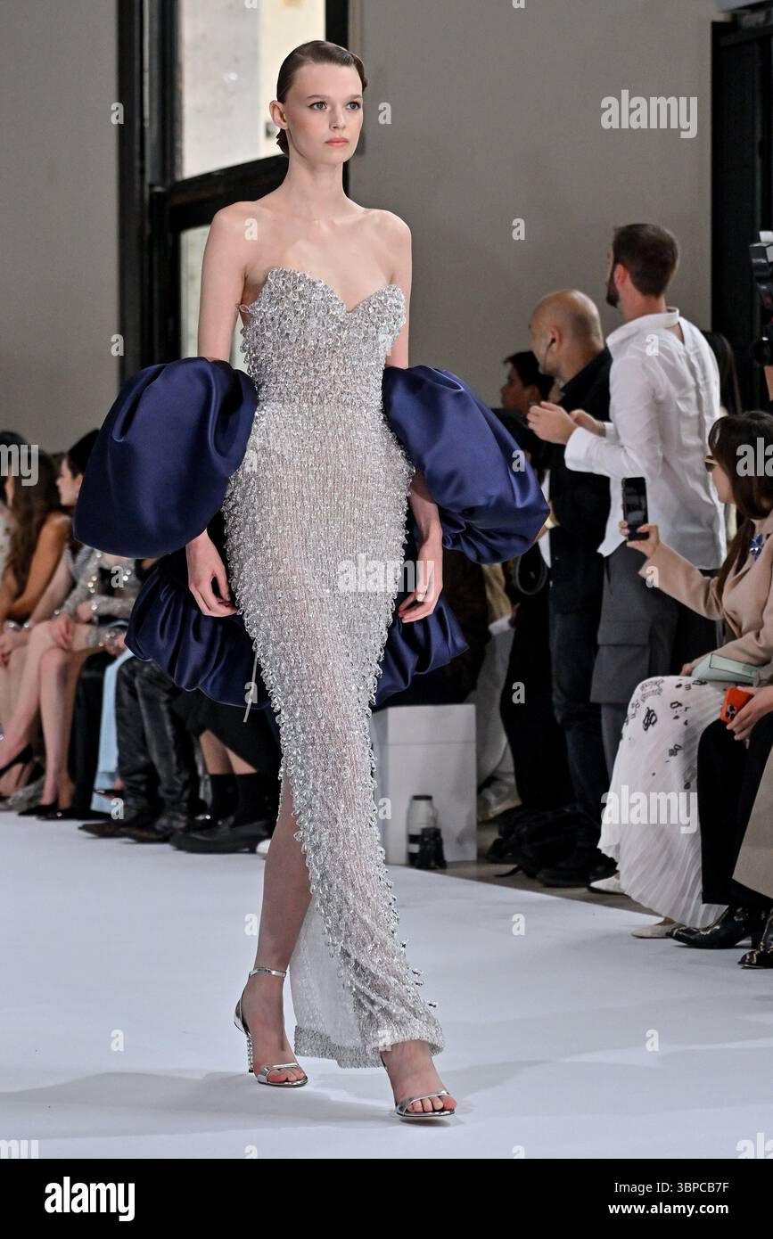 Paris, France. 07th July, 2025. A model walks the runway at the Tamara Ralph show as part of ...