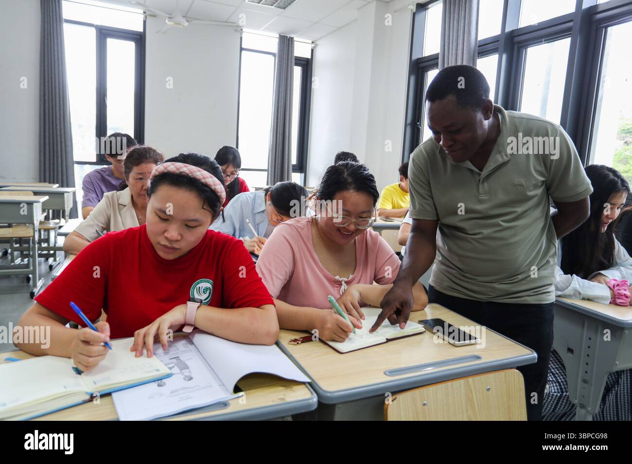 Dar Es Salaam, Tanzania. 4th July, 2025. Emmanuel Legonga (2nd R), a ...