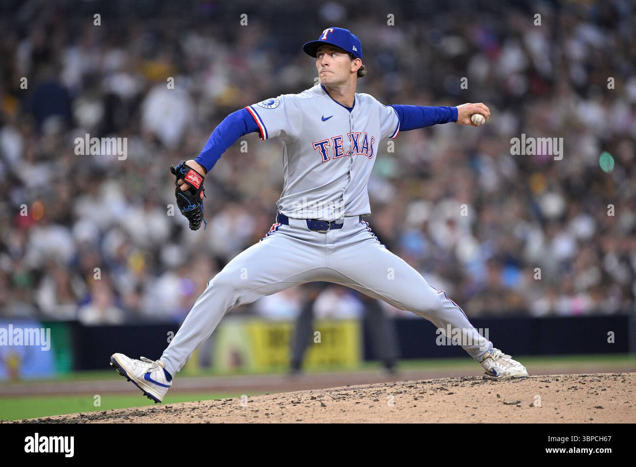 Texas Rangers relief pitcher Jacob Latz works against a San Diego ...