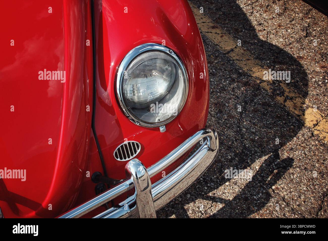 Red vintage Volkswagen Beetle front fender and headlight Stock Photo ...