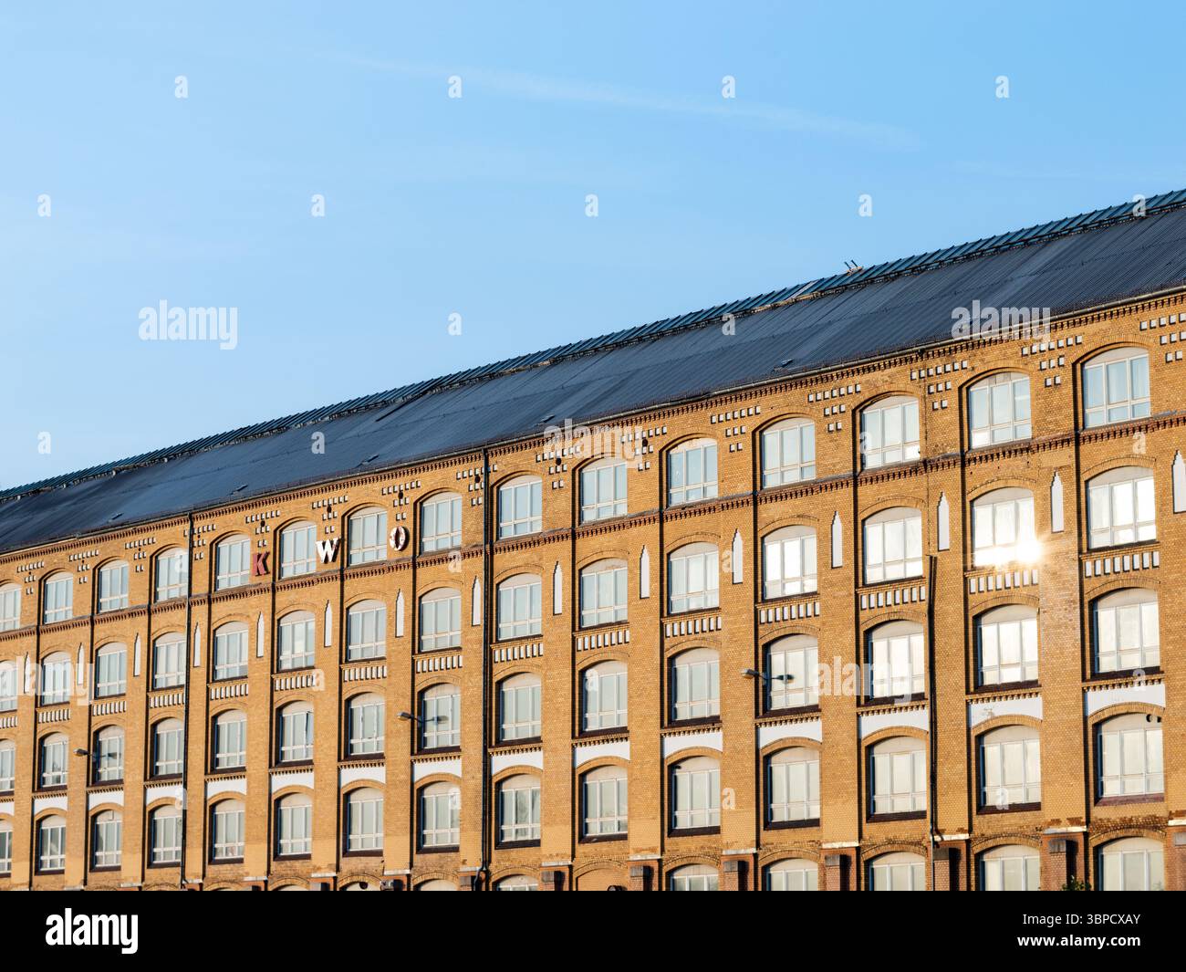 Former Kabelwerk Oberspree (KWO) building in Berlin, Germany. Facade of ...