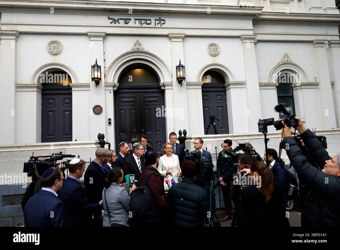 Opposition Leader Susan Ley speaks to the media with members of the ...