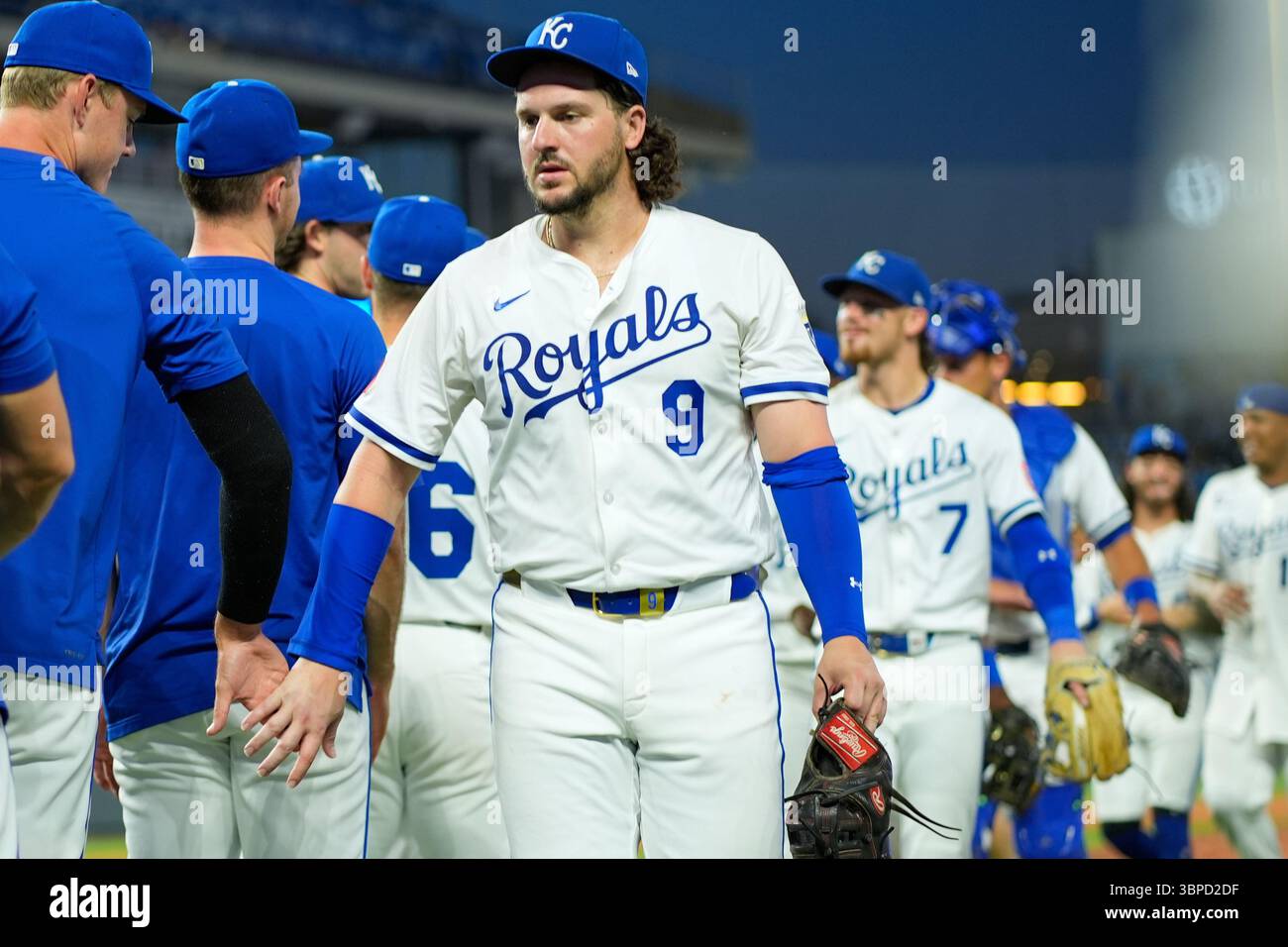 Kansas City Royals' Vinnie Pasquantino (9) celebrates with teammates ...
