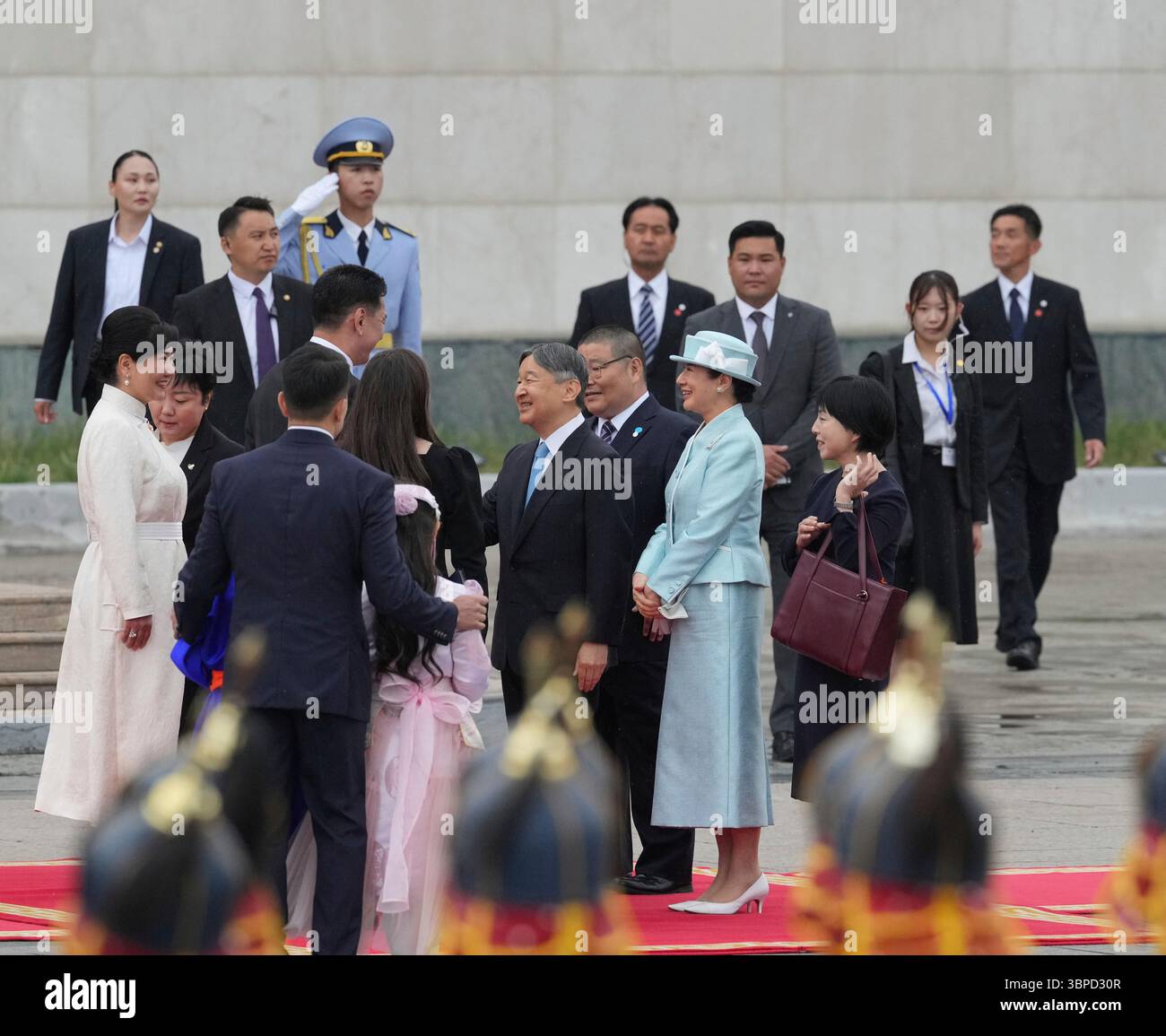 Japan's Emperor Naruhito and Empress Masako are greeted before the ...