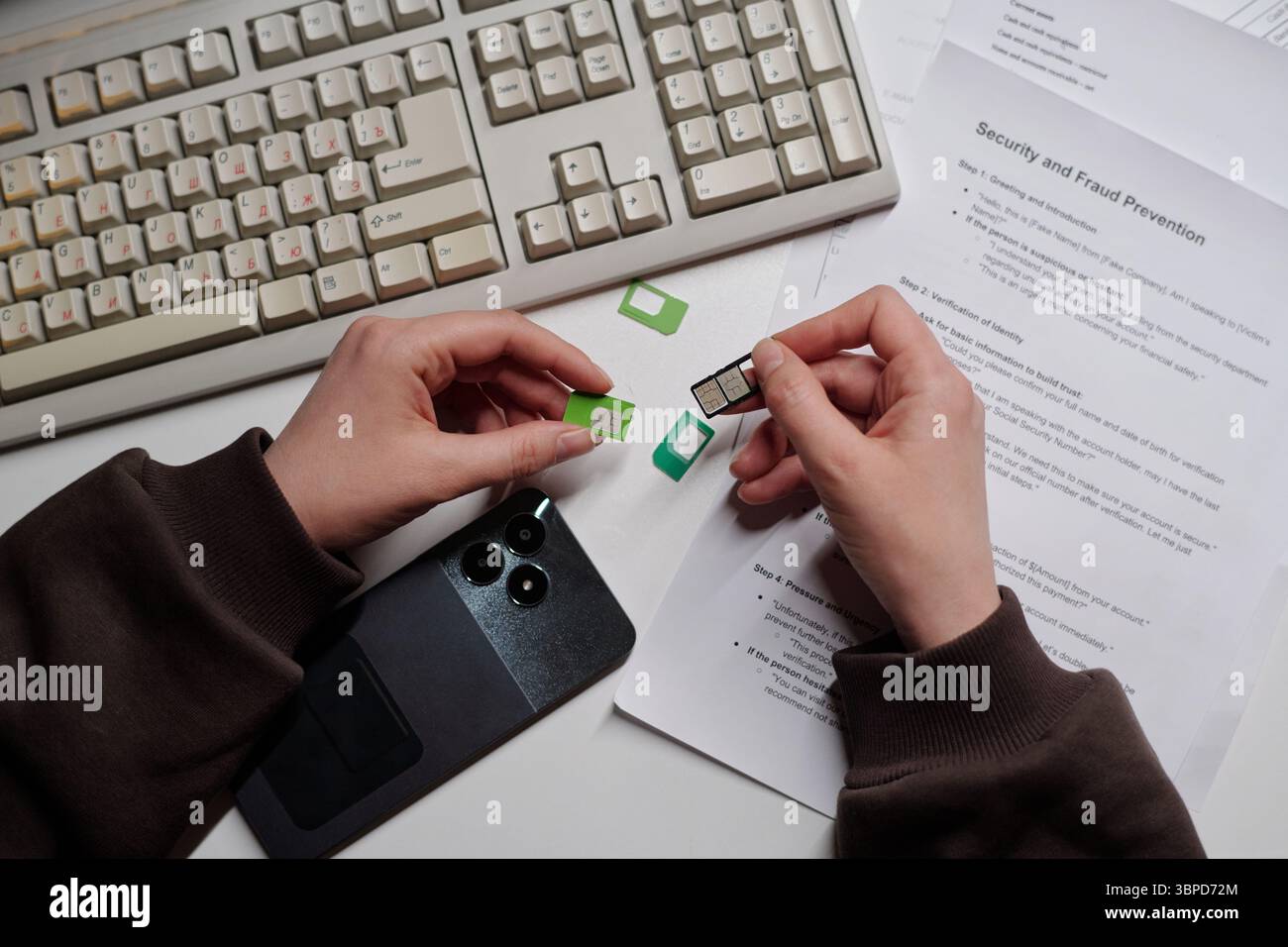 Woman holding SIM card and adapter near smartphone and documents ...