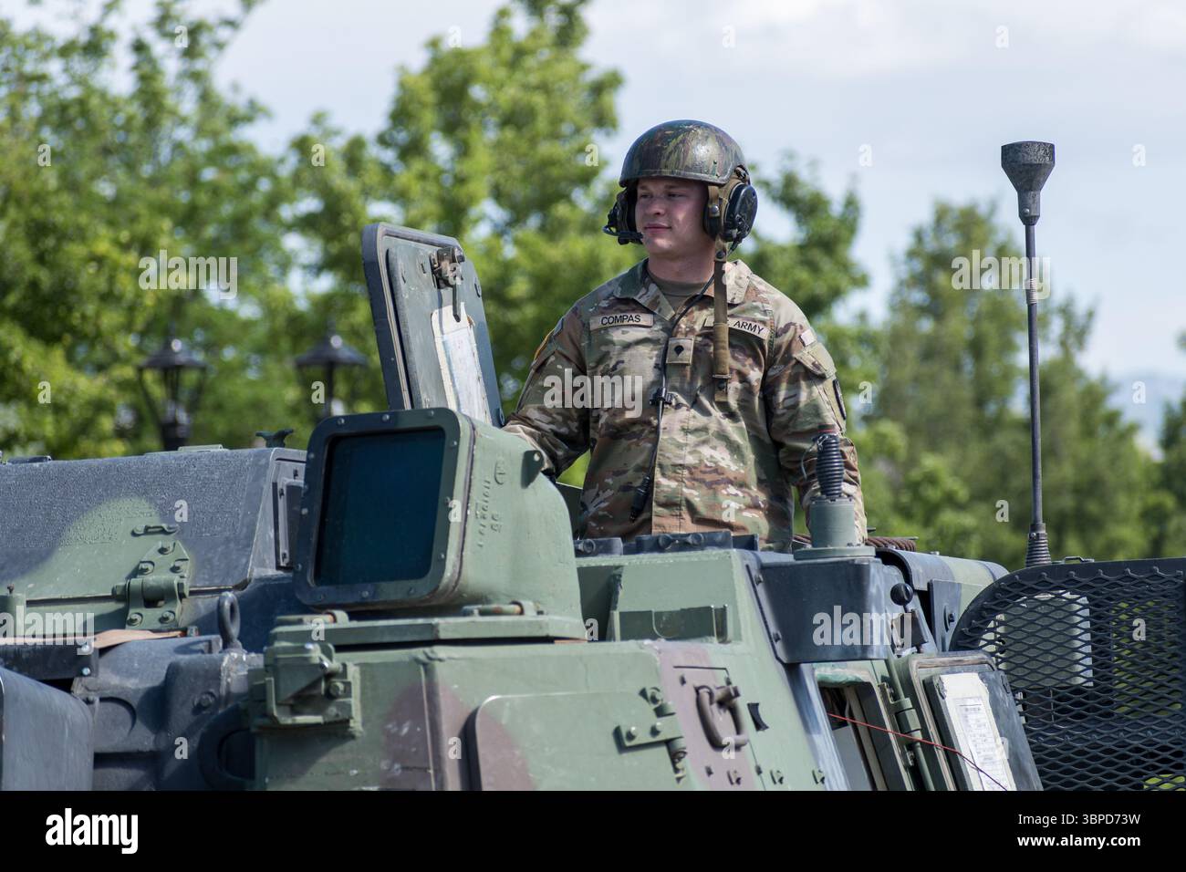 Provo, UT – July 4, 2025: US Army personnel ride atop a military ...