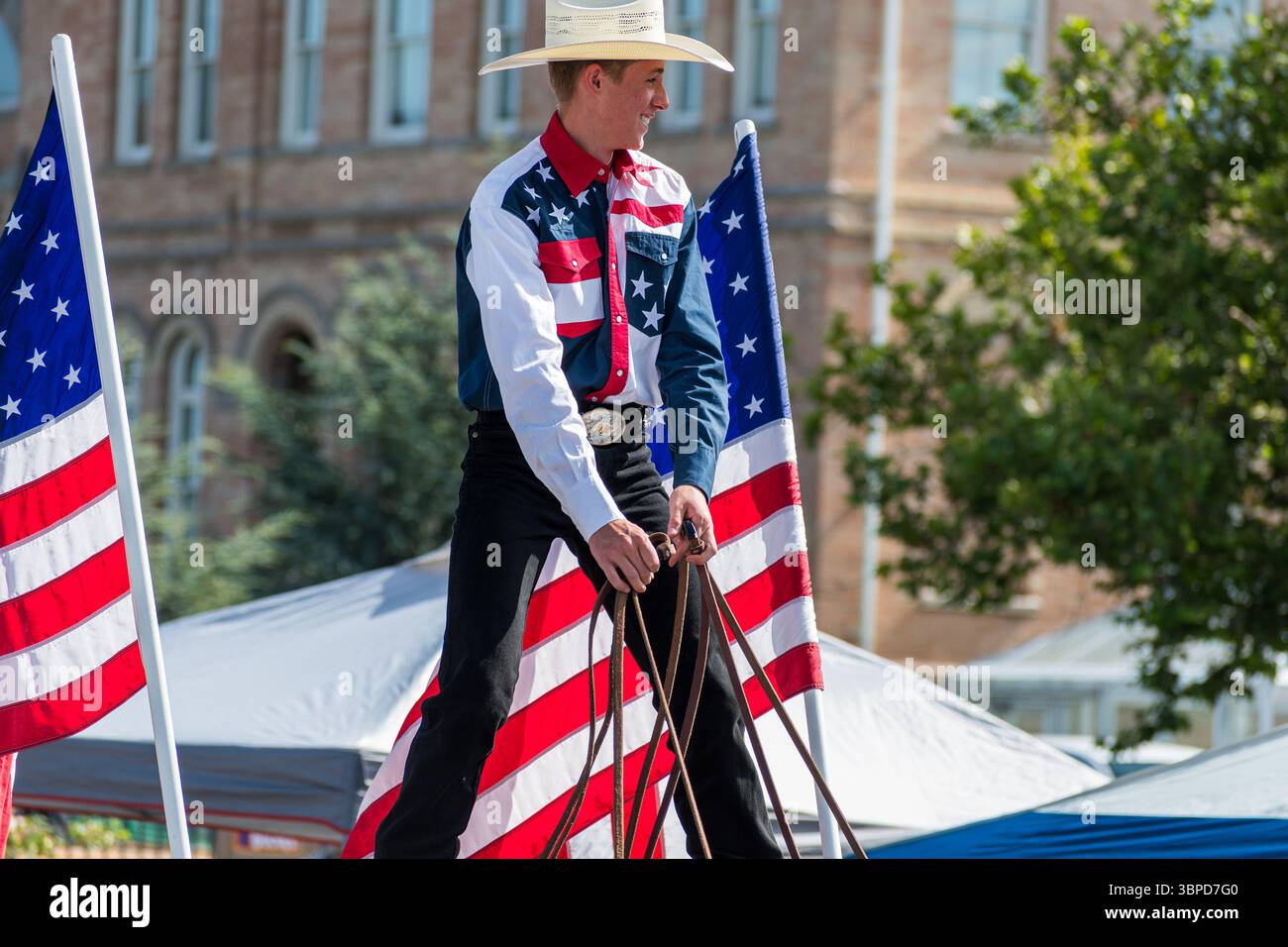 Provo, Utah – July 4, 2025: Western equestrian riders carry U.S. flags ...