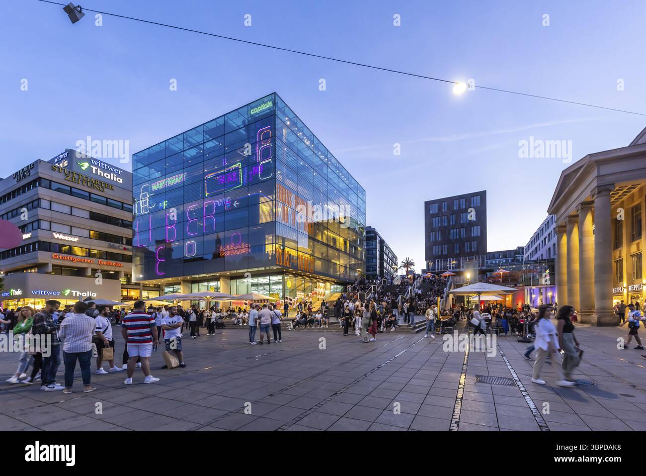 Stuttgart Art Museum in the evening with light installation and people ...
