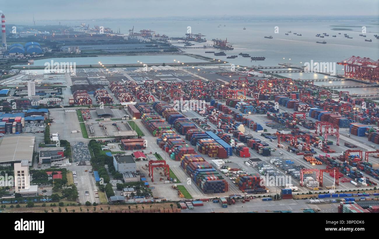 Cargo ships are loading and unloading containers at the container ...