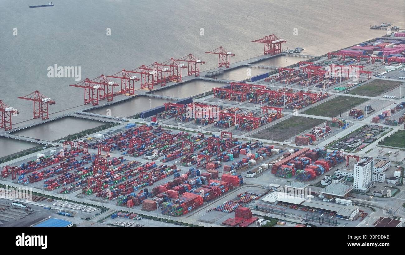 Cargo ships are loading and unloading containers at the container ...