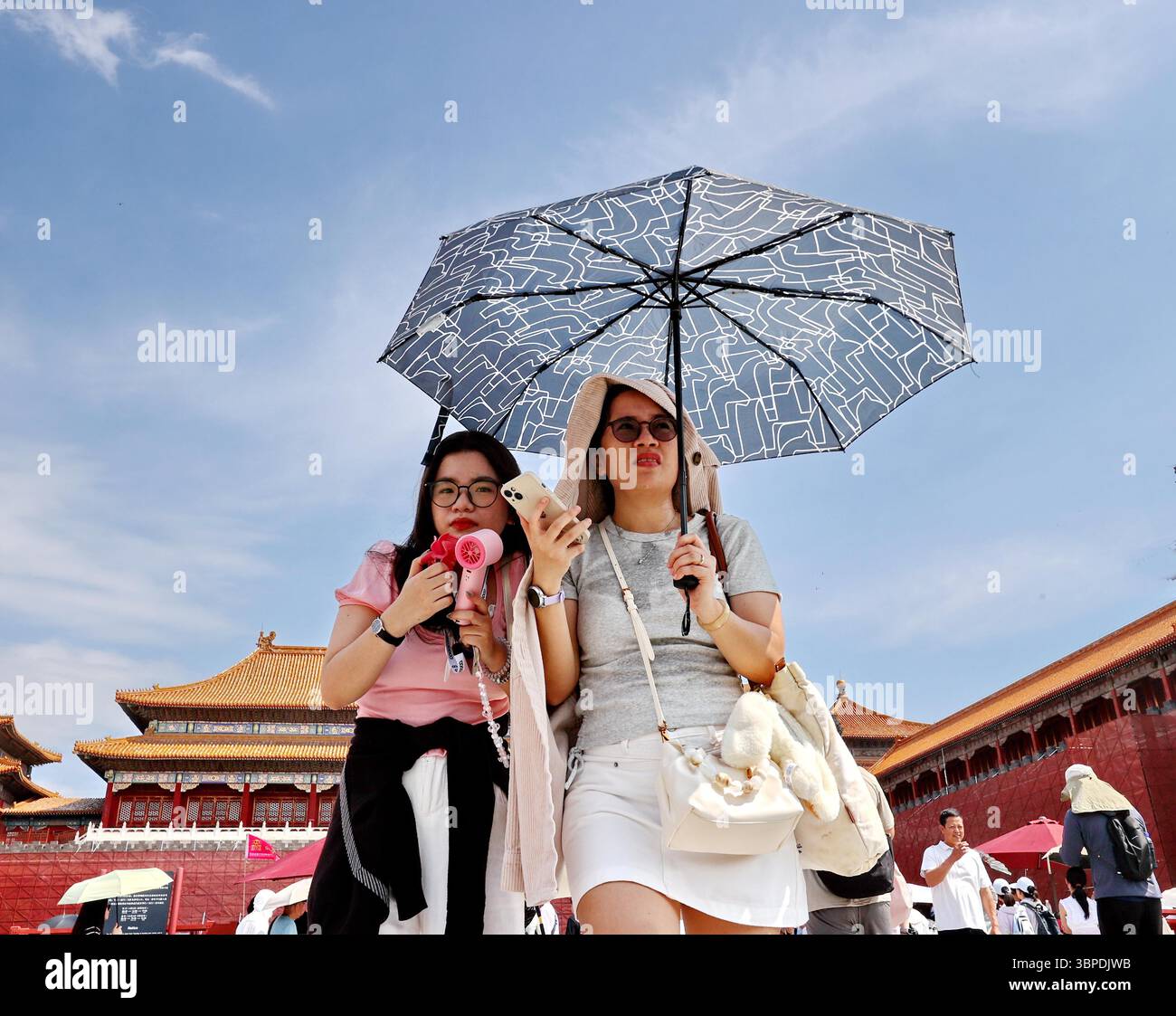 Tourists visit the Palace Museum amid hotwave in Beijing, China, 5 July ...