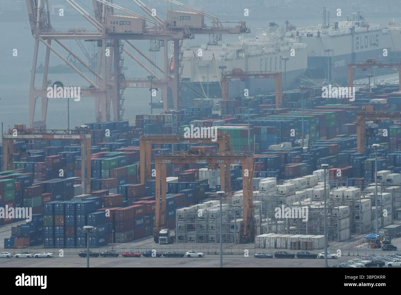 Cranes and shipping containers are seen at a port in Pyeongtaek, South ...