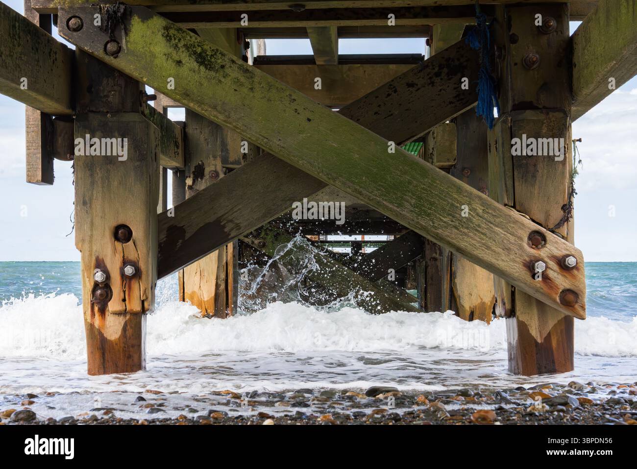 Waves splashing under Jetty next to Aberystwyth Peir, Wales, UK Stock ...