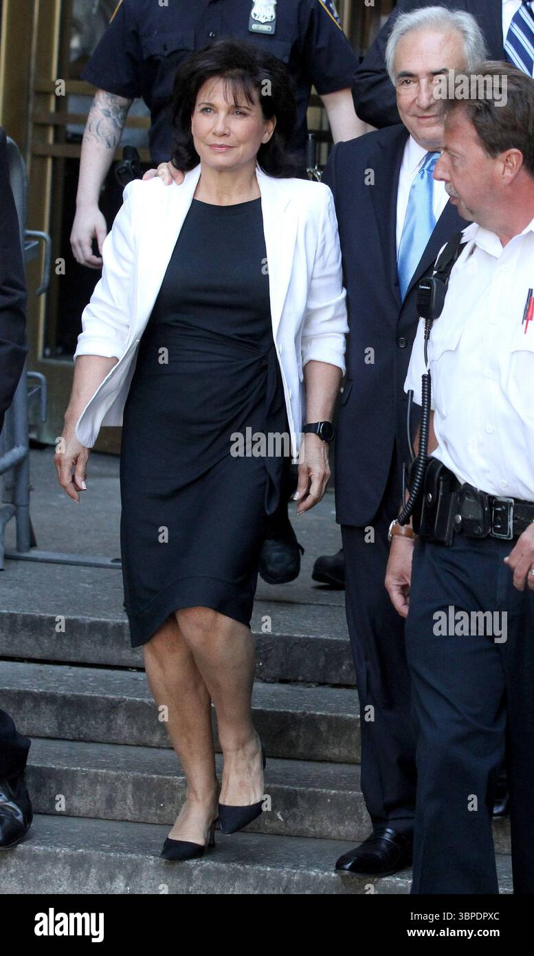 Former IMF Chief Dominique Strauss-Kahn and wife Anne Sinclair outside court in New York City ...
