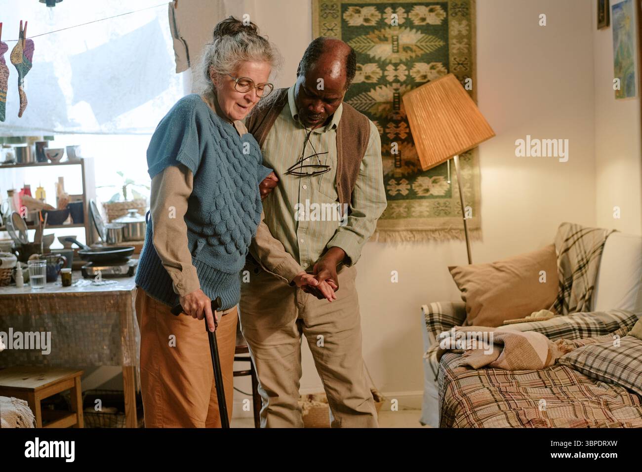 Senior Caucasian Woman and Senior Black Man Supporting Each Other Stock ...