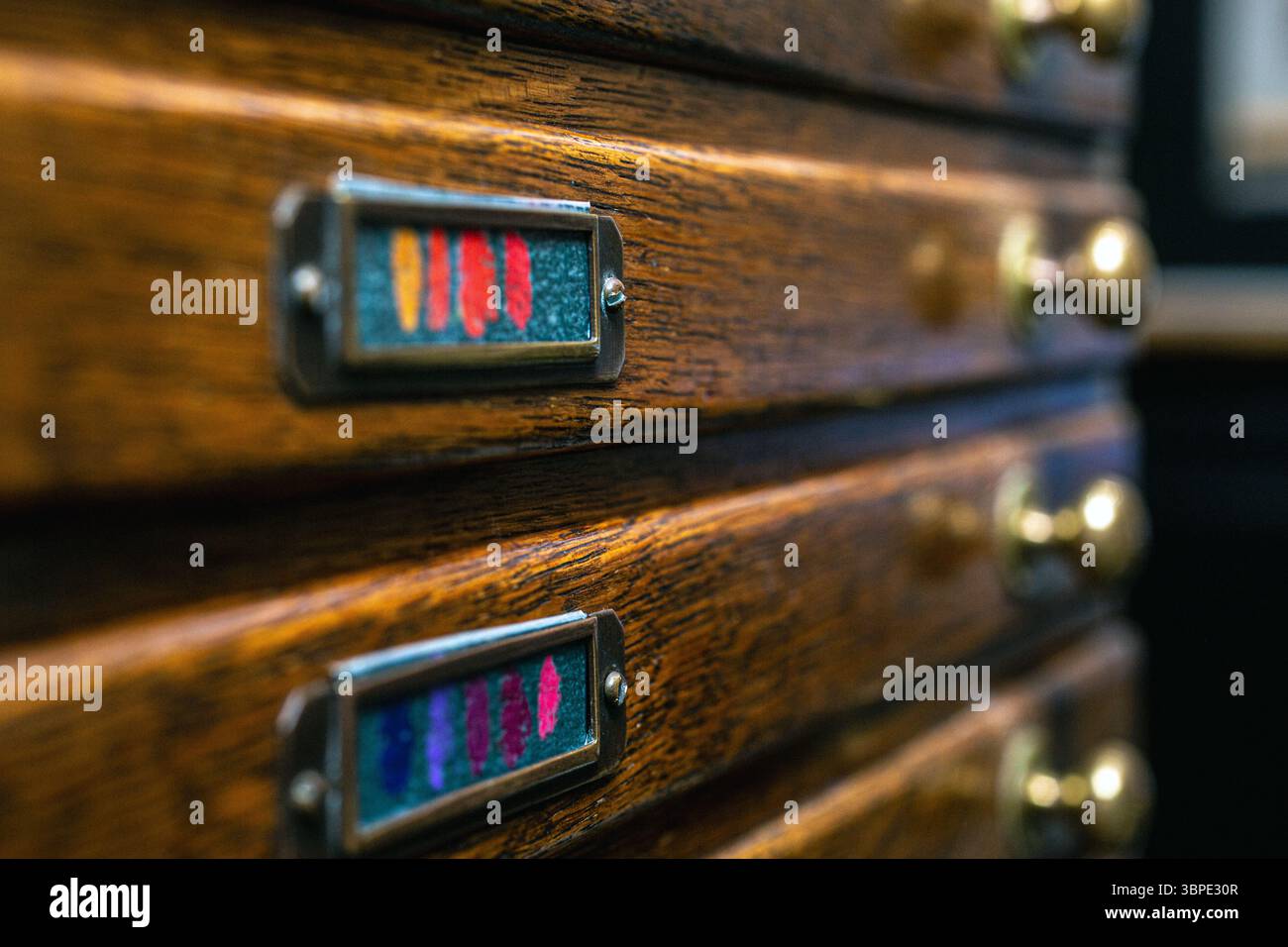 Antique arts and craft drawer art storage furniture Stock Photo - Alamy