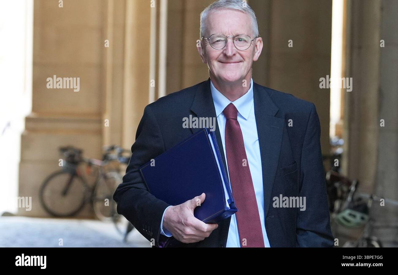 Northern Ireland Secretary of State Hilary Benn arrives in Downing ...