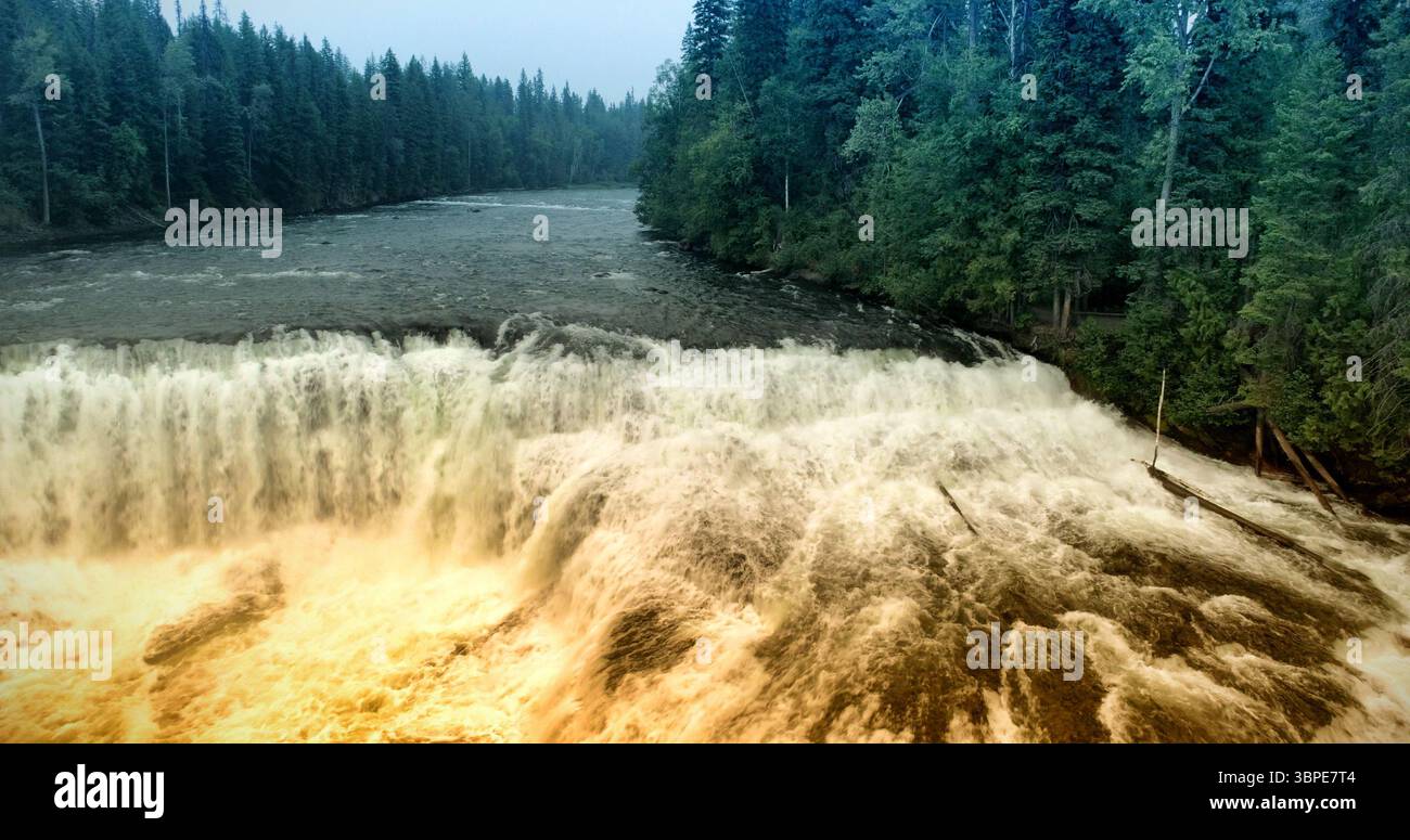 vector waterfall plunging over river ledge into rapids, mist rising ...