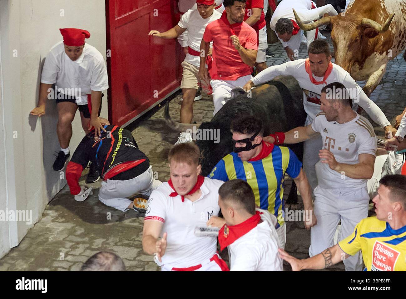 Pamplona, Spain. 07th July, 2025. Bulls run through the streets during ...