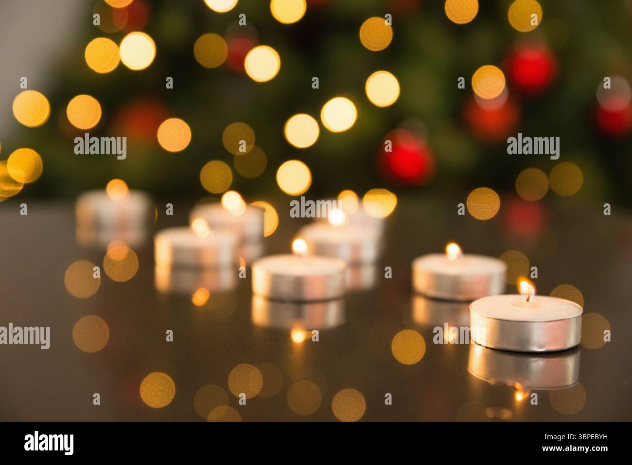 Tea light candles lit hi-res stock photography and images - Alamy