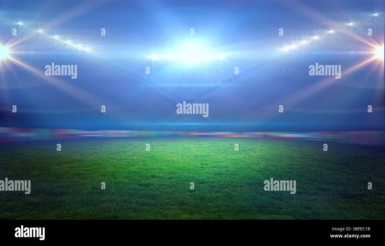 Green grass turf is glowing under stadium floodlights with silhouetted ...
