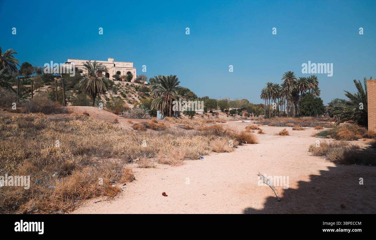 Visitors discover the remnants of Saddam Hussein Palace, nestled in a ...