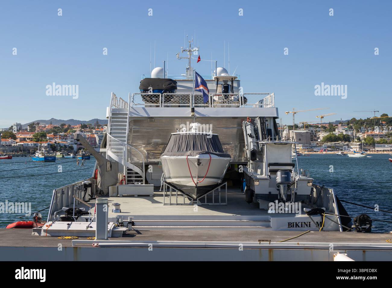 Suri, a luxury expedition yacht, showcases its stern with tender boats ...