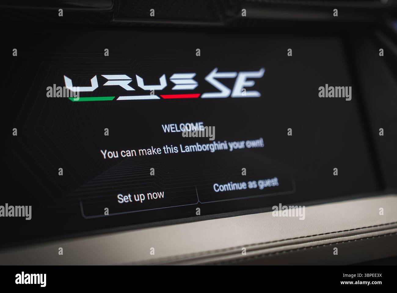 Infotainment screen inside a Lamborghini Urus showing a welcome message ...