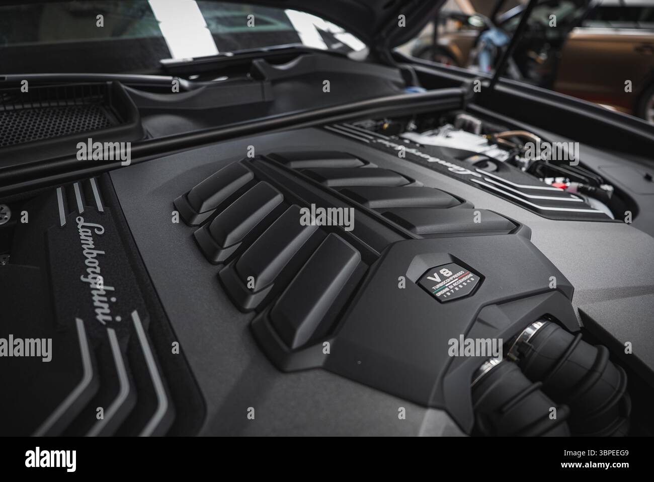 Detailed view of the Lamborghini Urus engine bay featuring the V8 ...