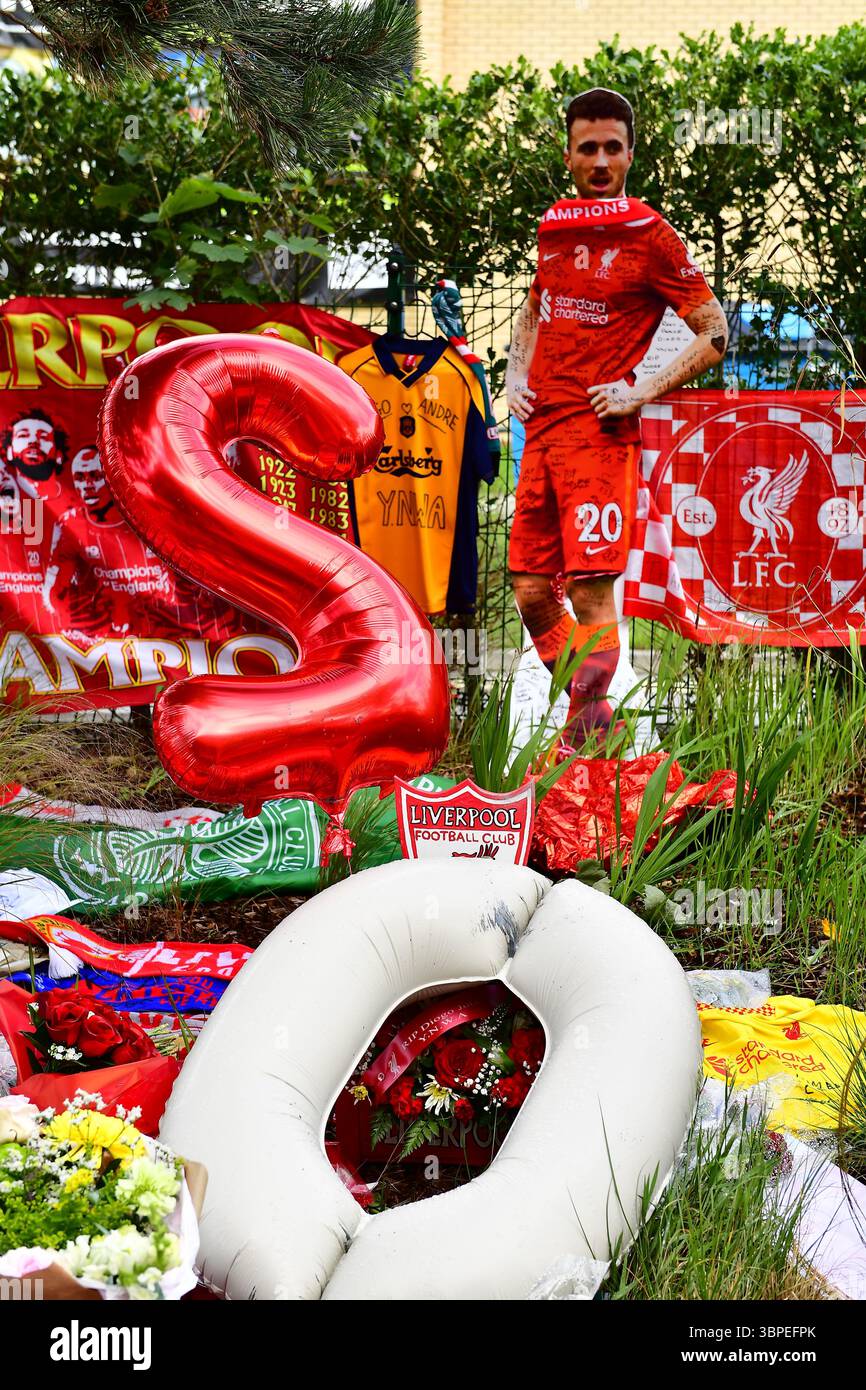 Floral tributes,scarves,balloons,messages of condolance etc are placed ...