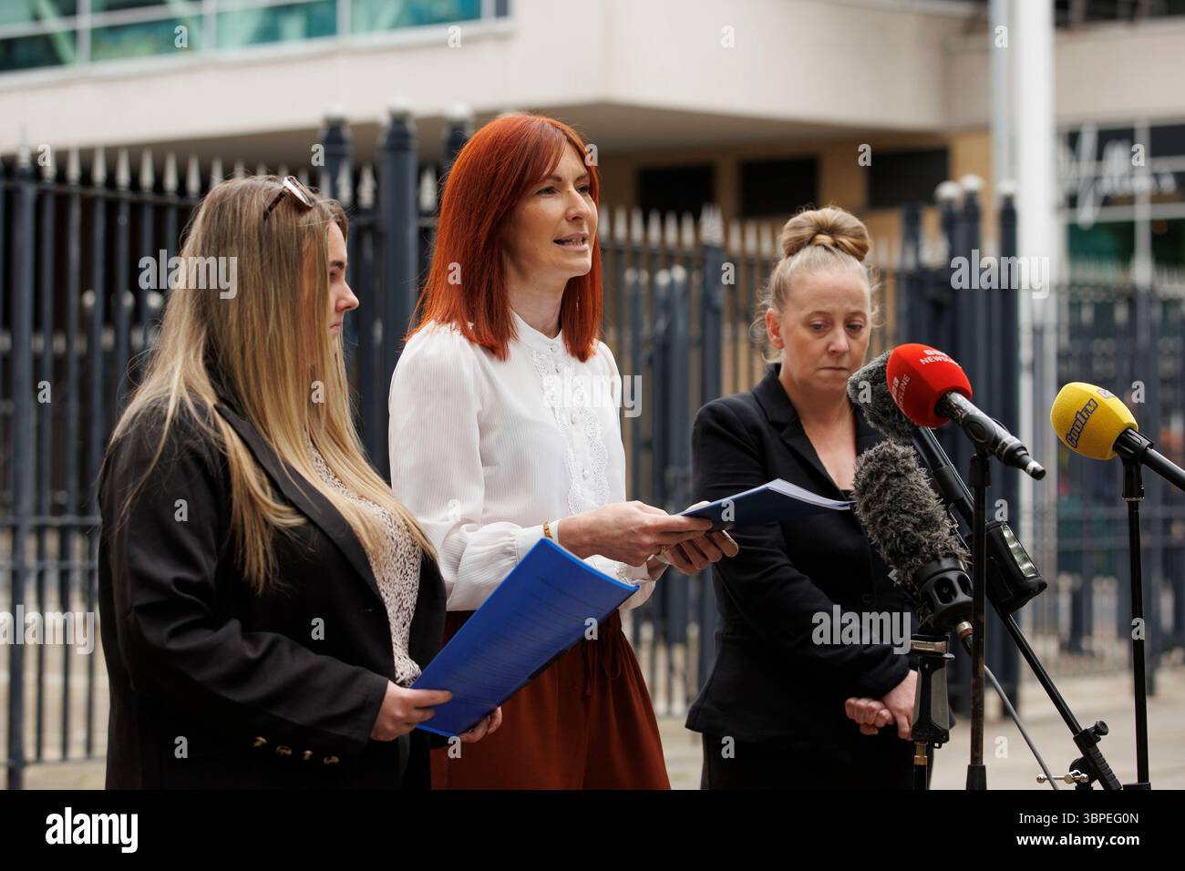 Detective Inspector Claire McGarvey (centre) speaks to the media with ...