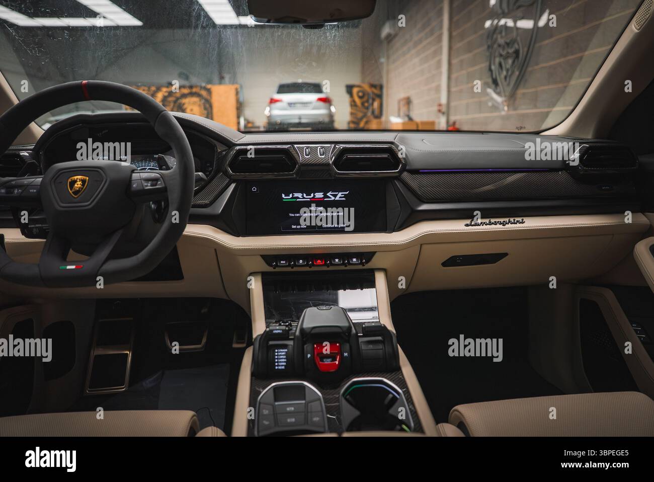 Close view of Lamborghini Urus S interior featuring dashboard, steering ...