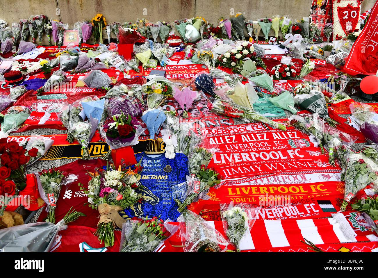Floral tributes,scarves,balloons,messages of condolance etc are placed ...