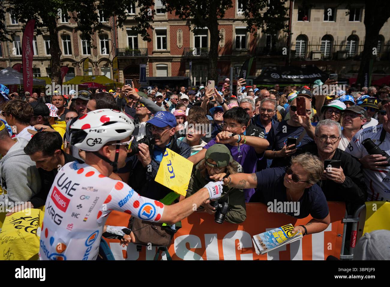 Belgium's Tim Wellens wearing the best climber's dotted jersey signs ...