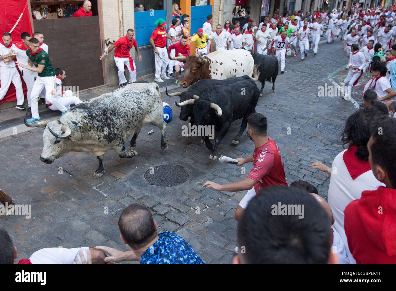 Pamplona, Spain. 08th July, 2025. Runners ascend the famous Santo ...